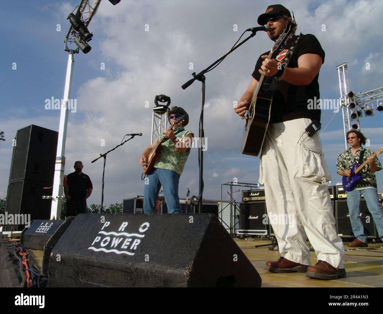 US Navy Ted Nugent, left, and country singer Toby Keith, right, play ...