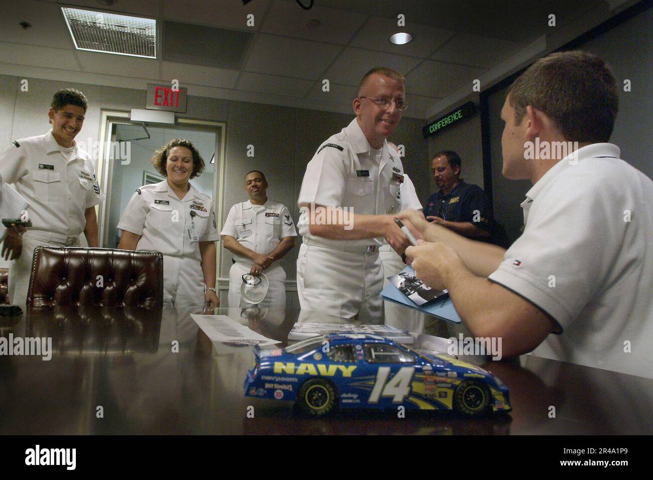 US Navy Casey Atwood, right, driver of the Navy sponsored NASCAR Bush ...