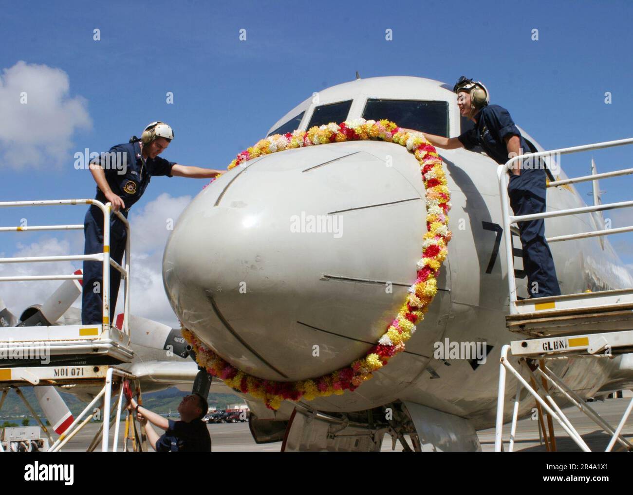 US Navy Sailors assigned to the Golden Swordsmen of Patrol Squadron ...