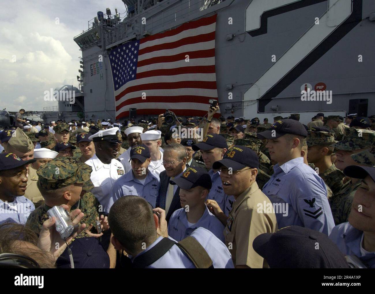 US Navy U.S. Secretary of Defense Donald Rumsfeld poses for pictures ...
