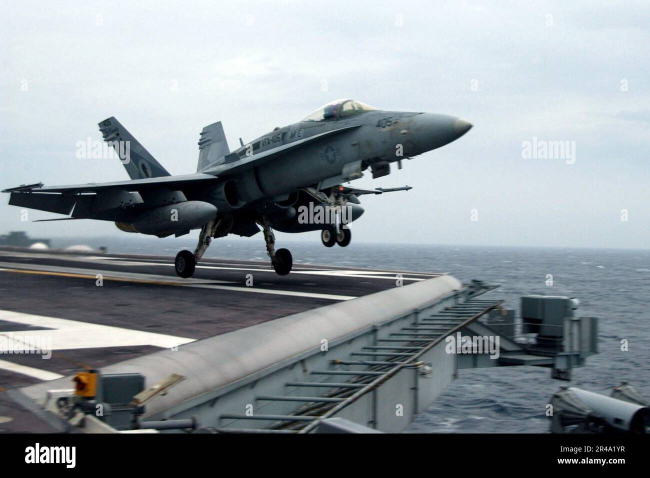 US Navy An F-18C Hornet assigned to the Gunslingers of Fighter Attack ...