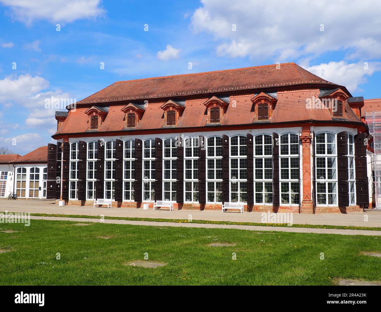 A modern orangery building features tall, rectangular windows that ...