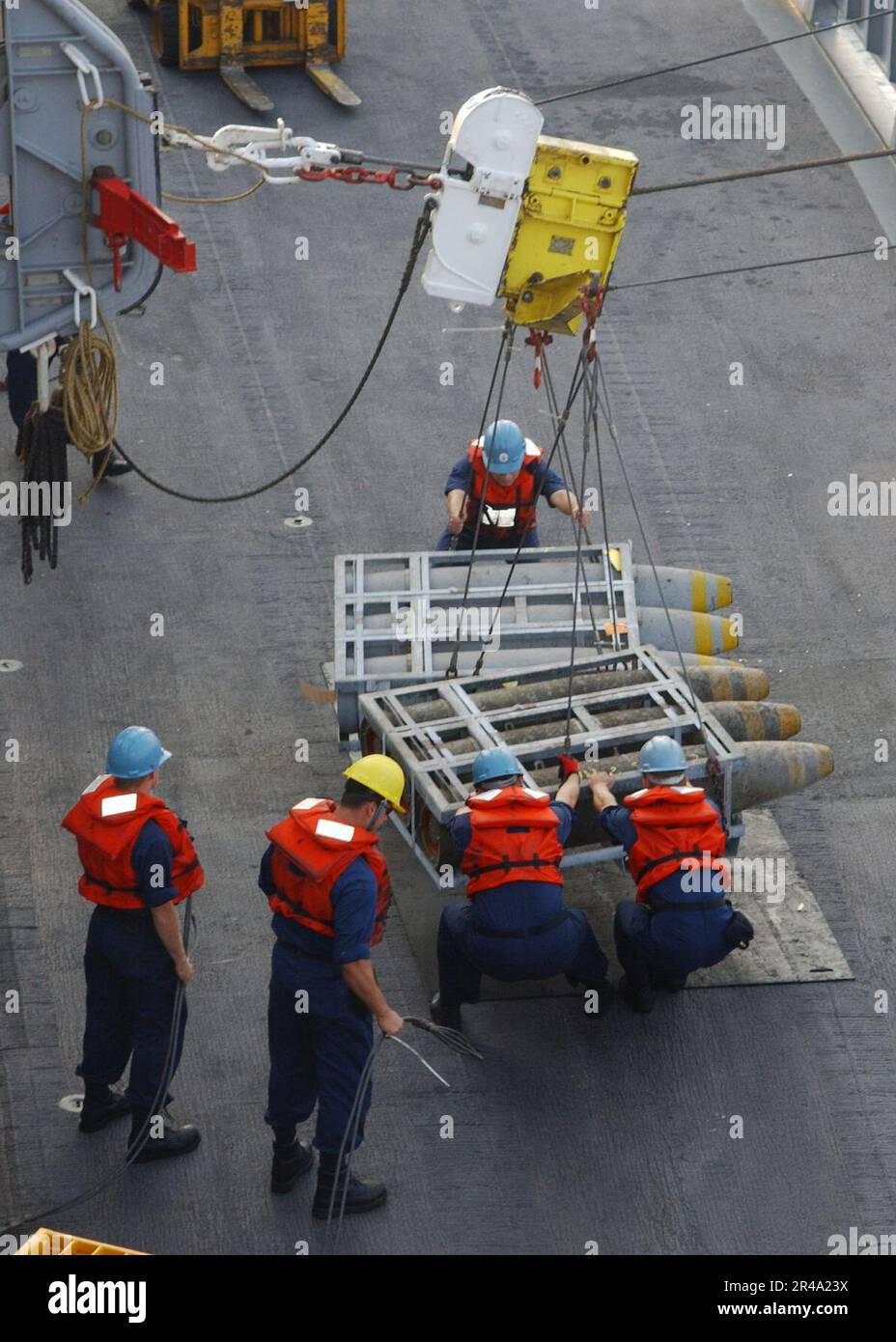 US Navy Sailors assigned to the fast combat support ship USS Seattle ...