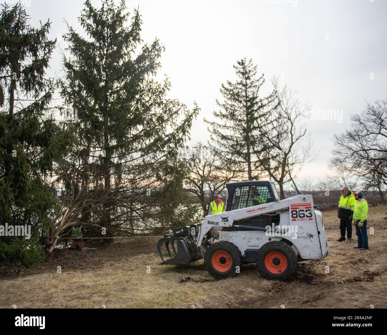 Ed Michek, 88th Civil Engineer Group work leader, uses a Bobcat skid ...