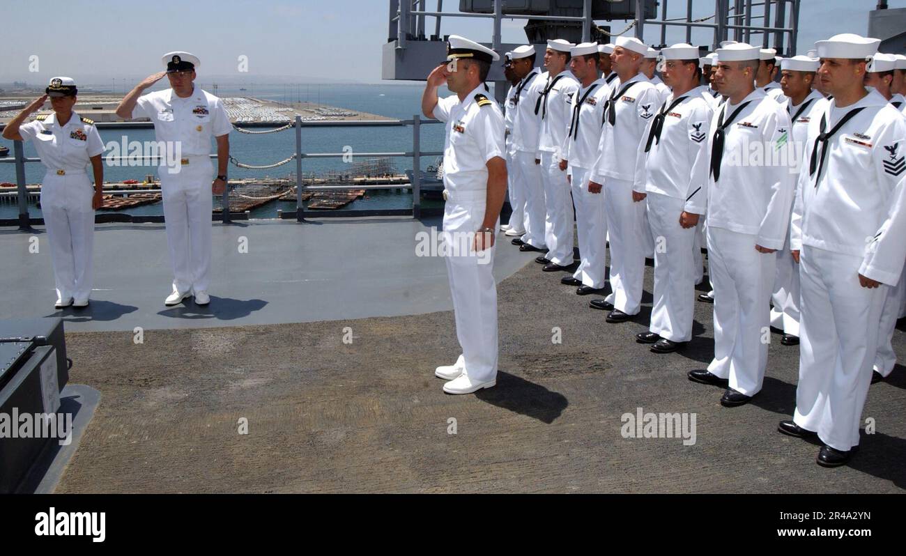 US Navy Twenty one shots from 40mm guns aboard the amphibious assault ...