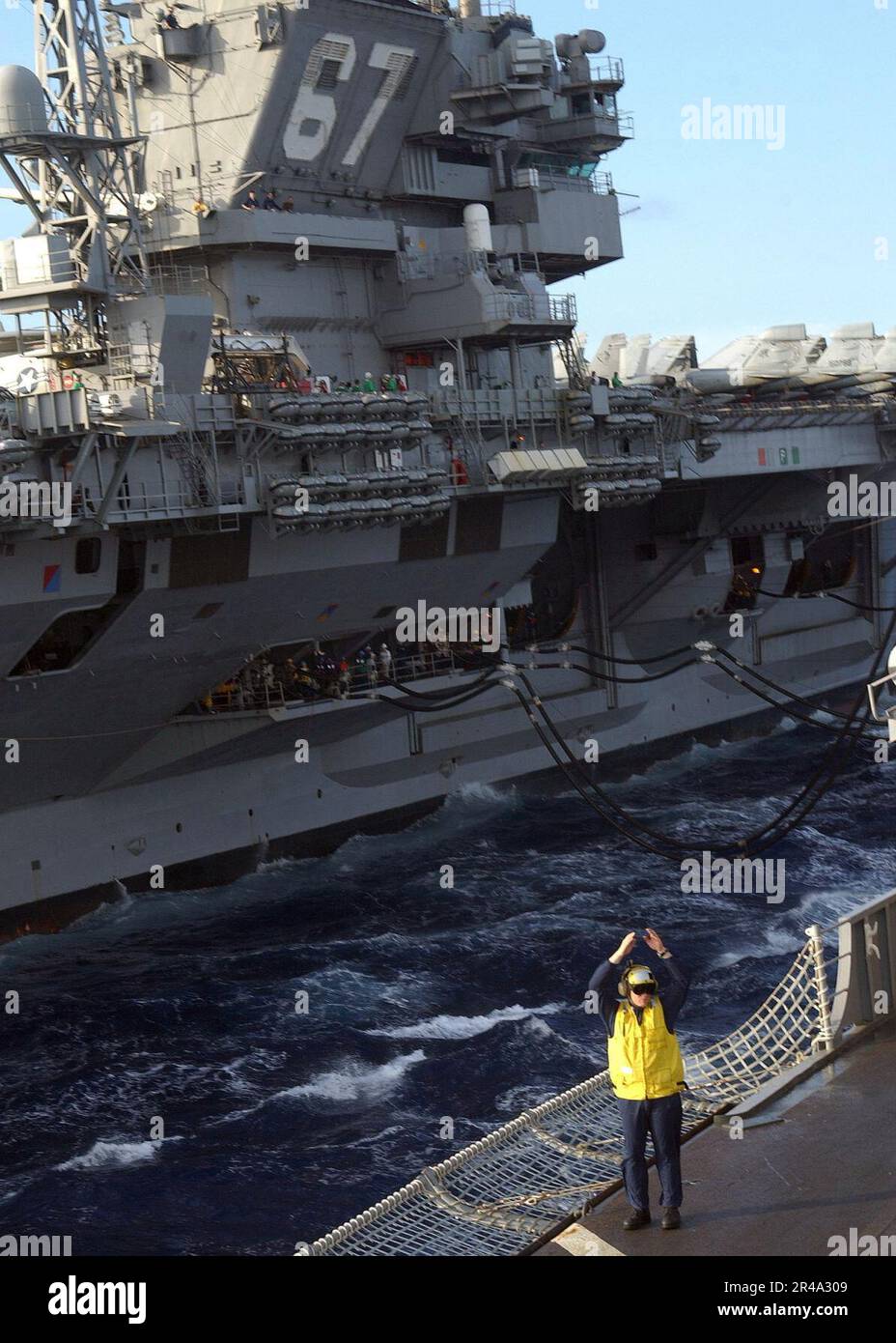 US Navy Landing Signal Enlisted (LSE) assigned to the fast combat ...