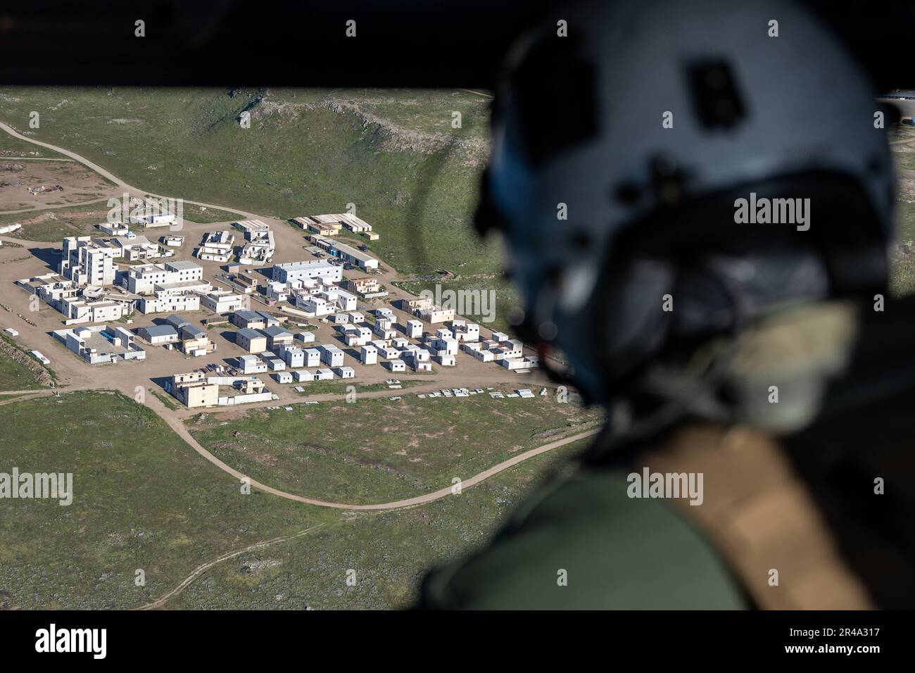 U.S. Marine Corps Gunnery Sgt. Joshua John Navarro, an aerial observer ...