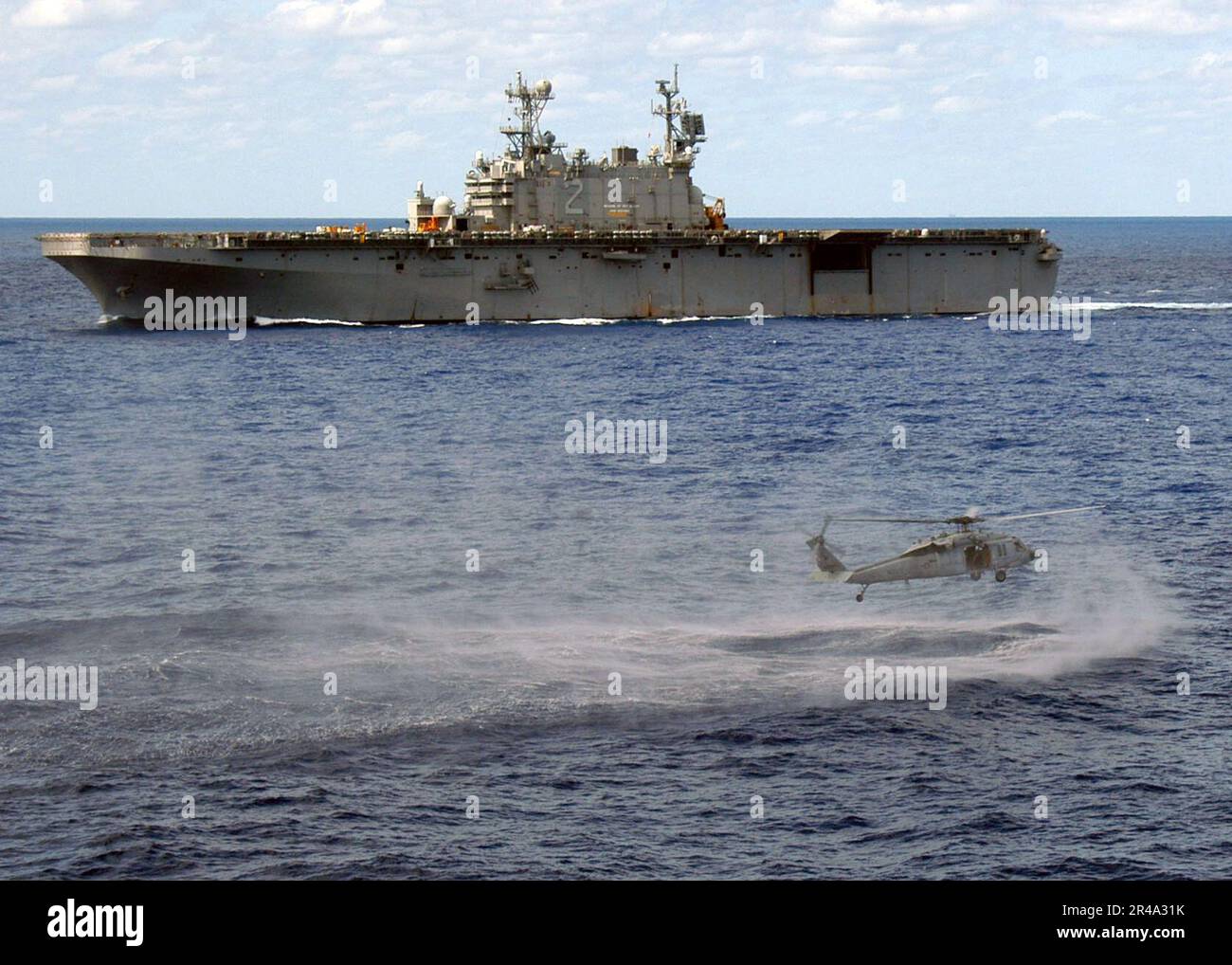 US Navy An MH-60S Knight Hawk helicopter prepares to deploy Search and ...
