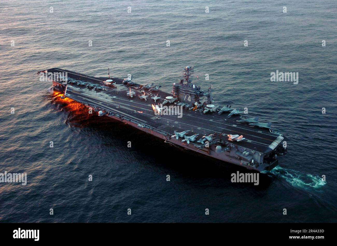 US Navy The Nimitz-class aircraft carrier USS John C. Stennis (CVN 74) steams through the calm ...
