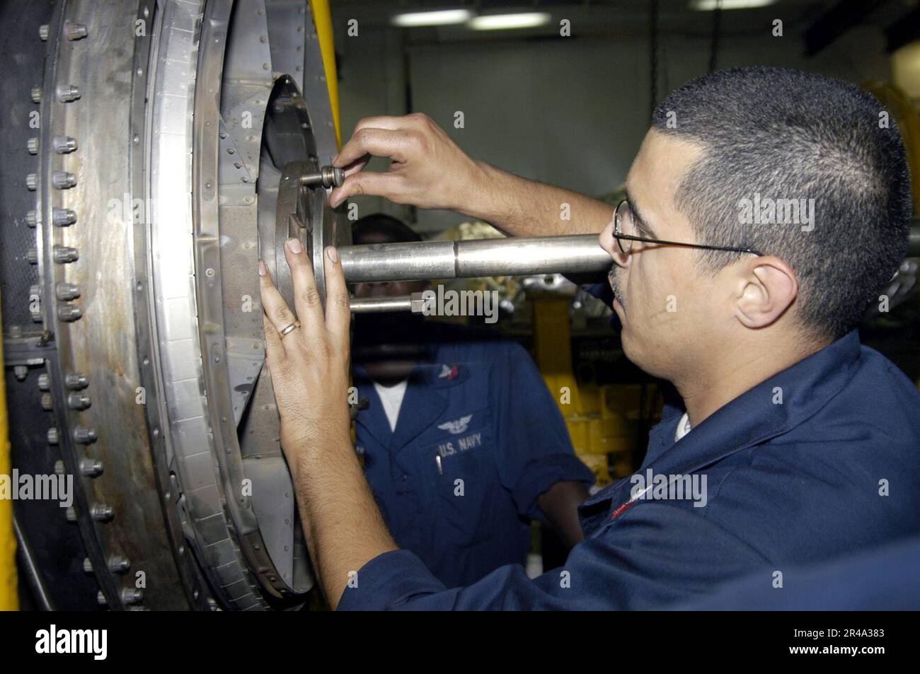 US Navy Aviation Structural Mechanic 1st Class conducts routine ...