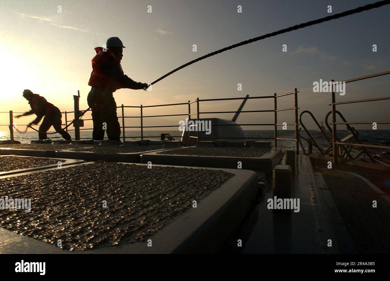 US Navy Seamen assigned to the guided missile cruiser USS Anzio (CG 68 ...