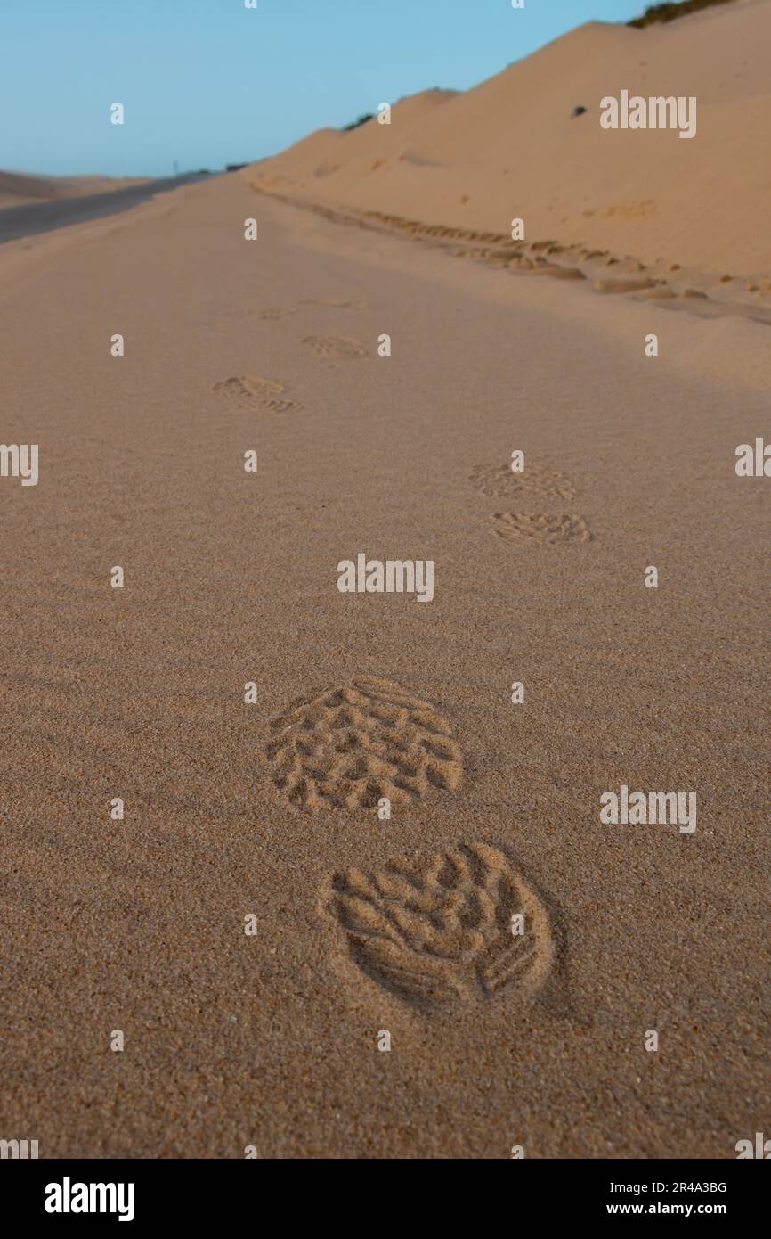 The human footprints in the sand Stock Photo - Alamy