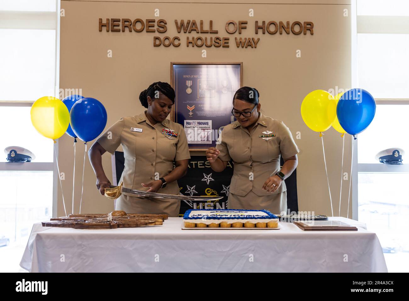 U.S. Navy Master Chief Crystal Ingram, left, Senior Enlisted Leader for ...