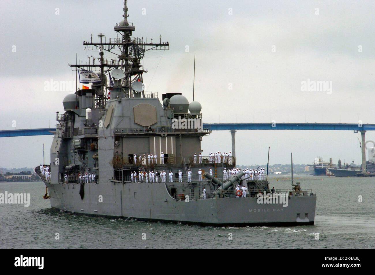 US Navy Sailors aboard the Ticonderoga-class guided missile cruiser USS ...
