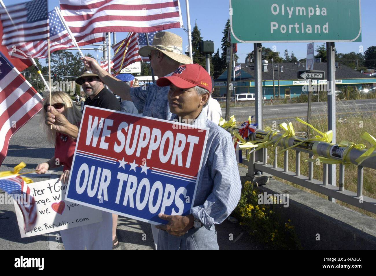 US Navy Tri Ngo and members of Operation Support Our Troops (OSOT ...