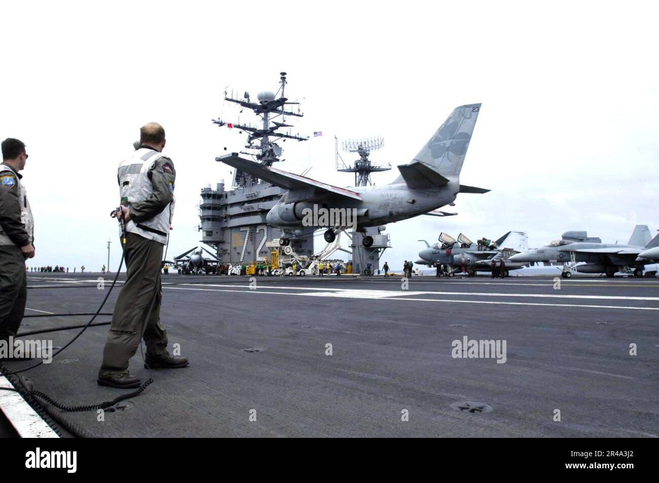 US Navy A Landing Signal Officer (LSO) monitors an S-3B Viking Stock ...