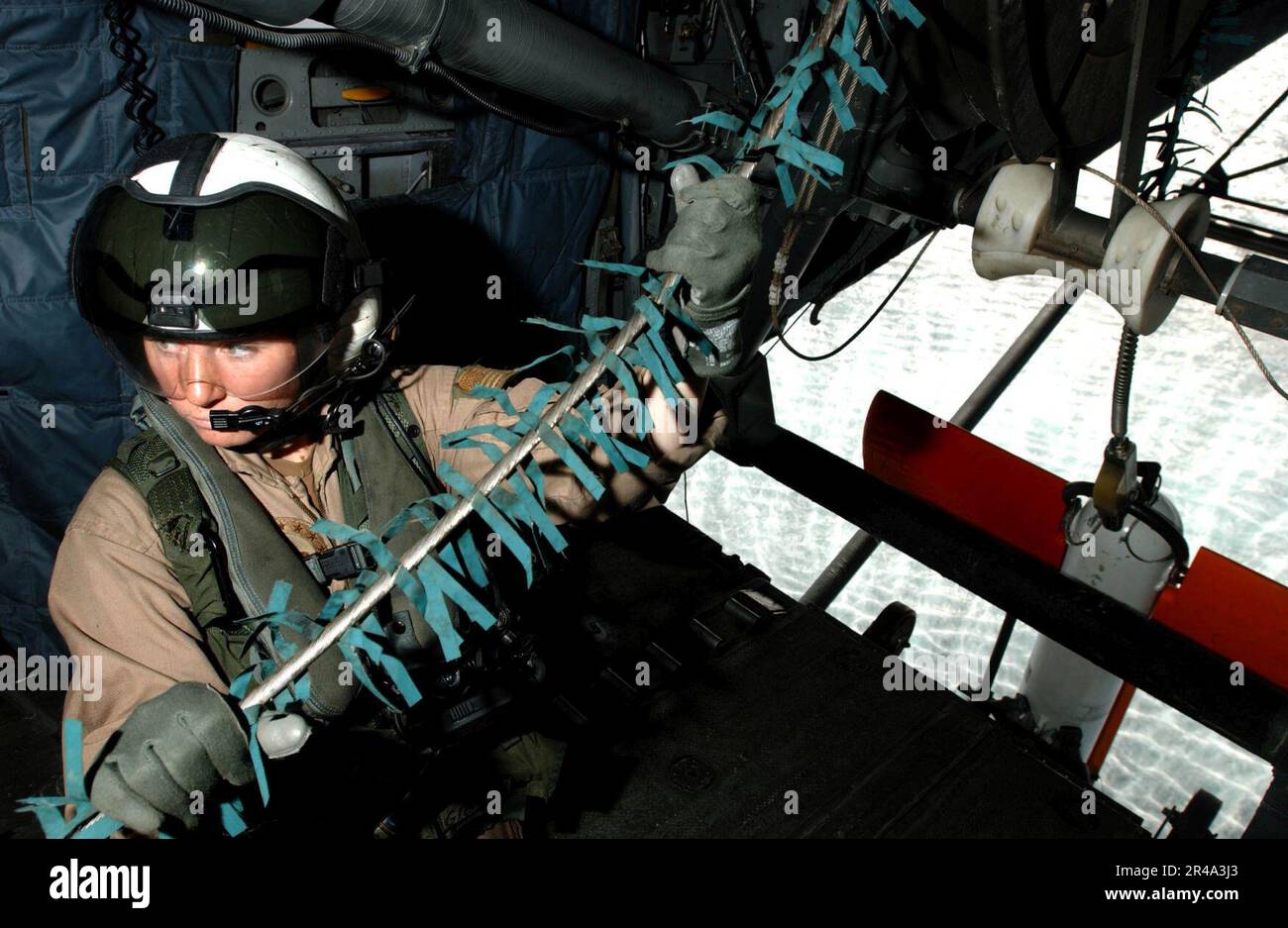 US Navy Aviation Electronics Technician Cassie Gibson lets out the tow ...