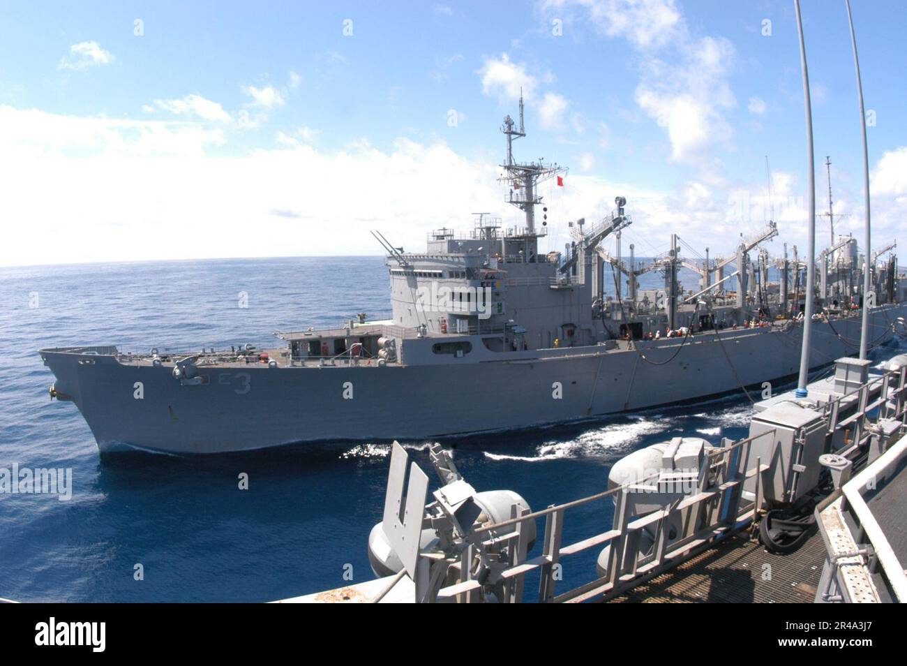 US Navy Fast combat support ship USS Seattle (AOE 3) steams alongside ...