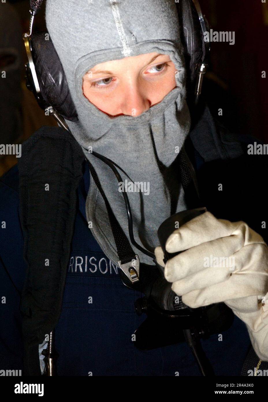 US Navy A sound powered phone talker assigned to Repair Locker One ...