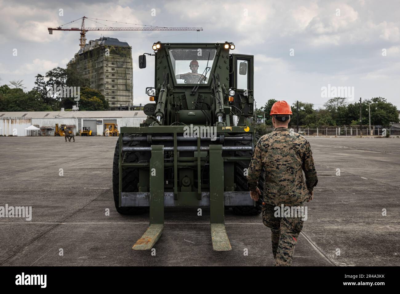 U.S. Marine Corps Cpl. Orlando Arias, a native of Lima, Peru, and Lance ...