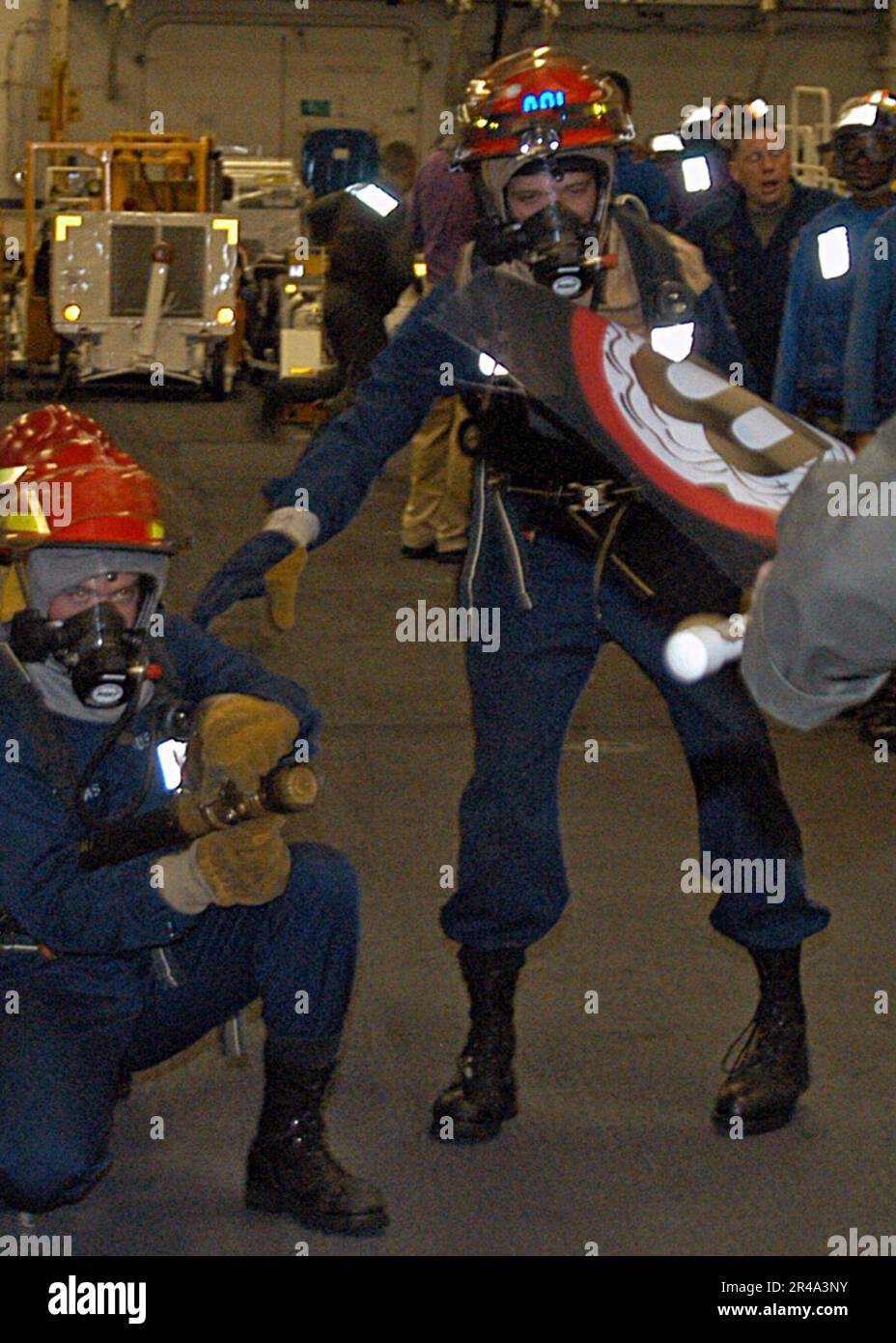 US Navy The ''at-sea fire party'' combats a simulated class bravo fire ...