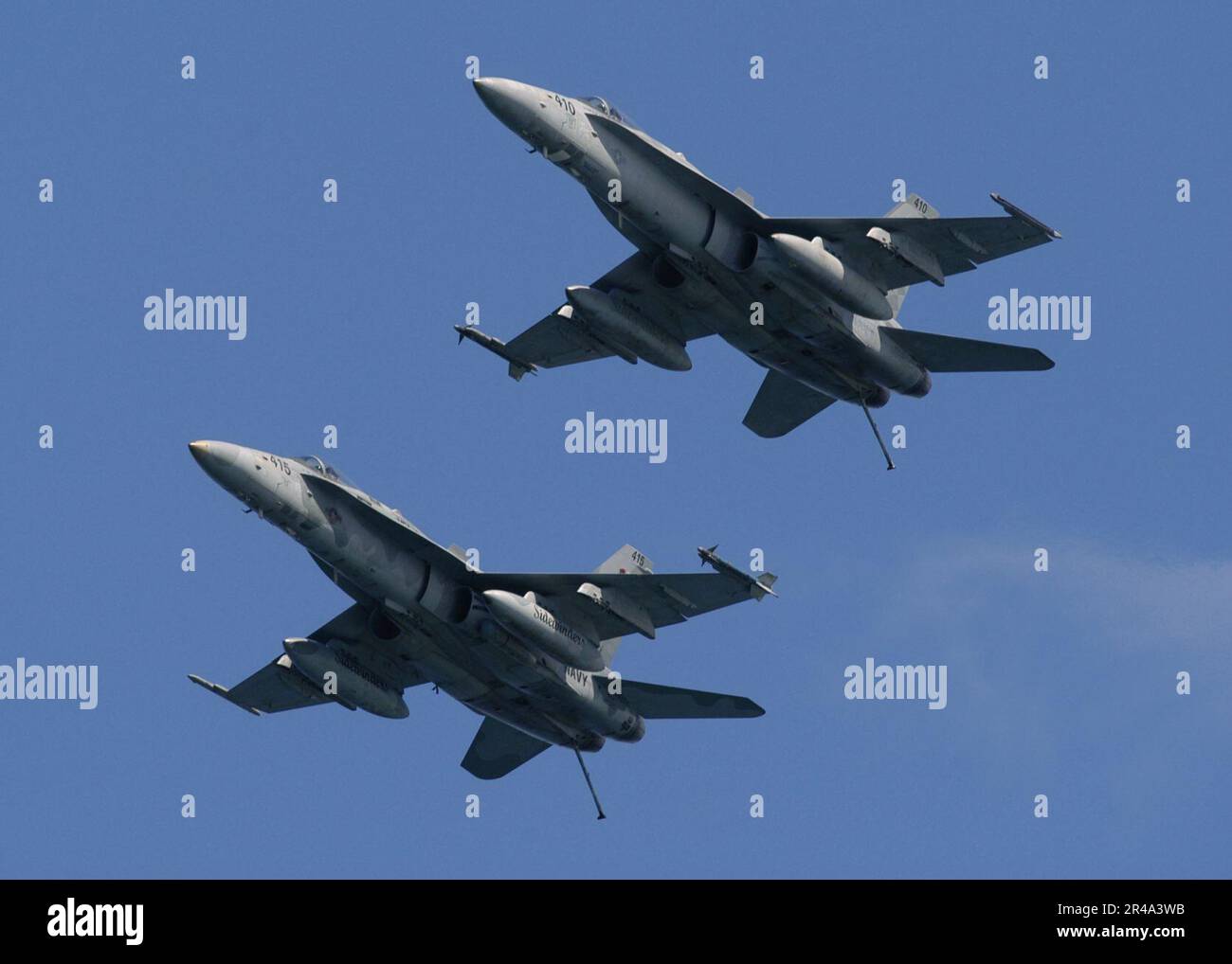 US Navy Two F-A-18C Hornets assigned to the Marauders of Strike Fighter ...