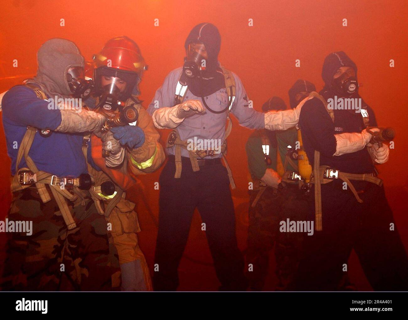 US Navy Sailors participate in firefighting drills during a General ...