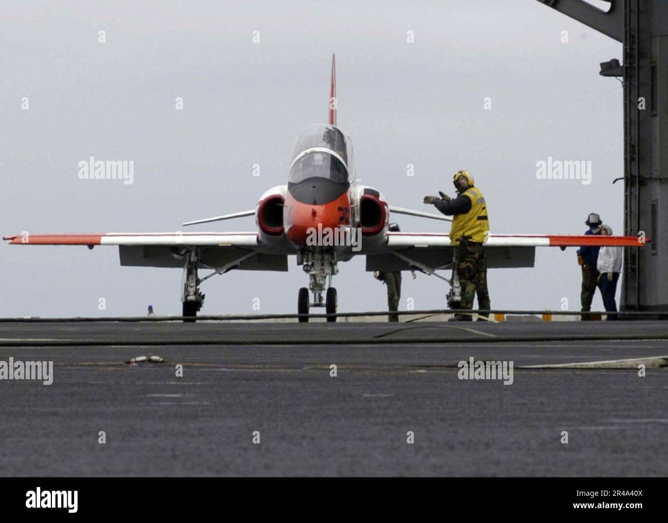 US Navy An Aviation Boatswain's Mate moves a T-45A Goshawk assigned to ...
