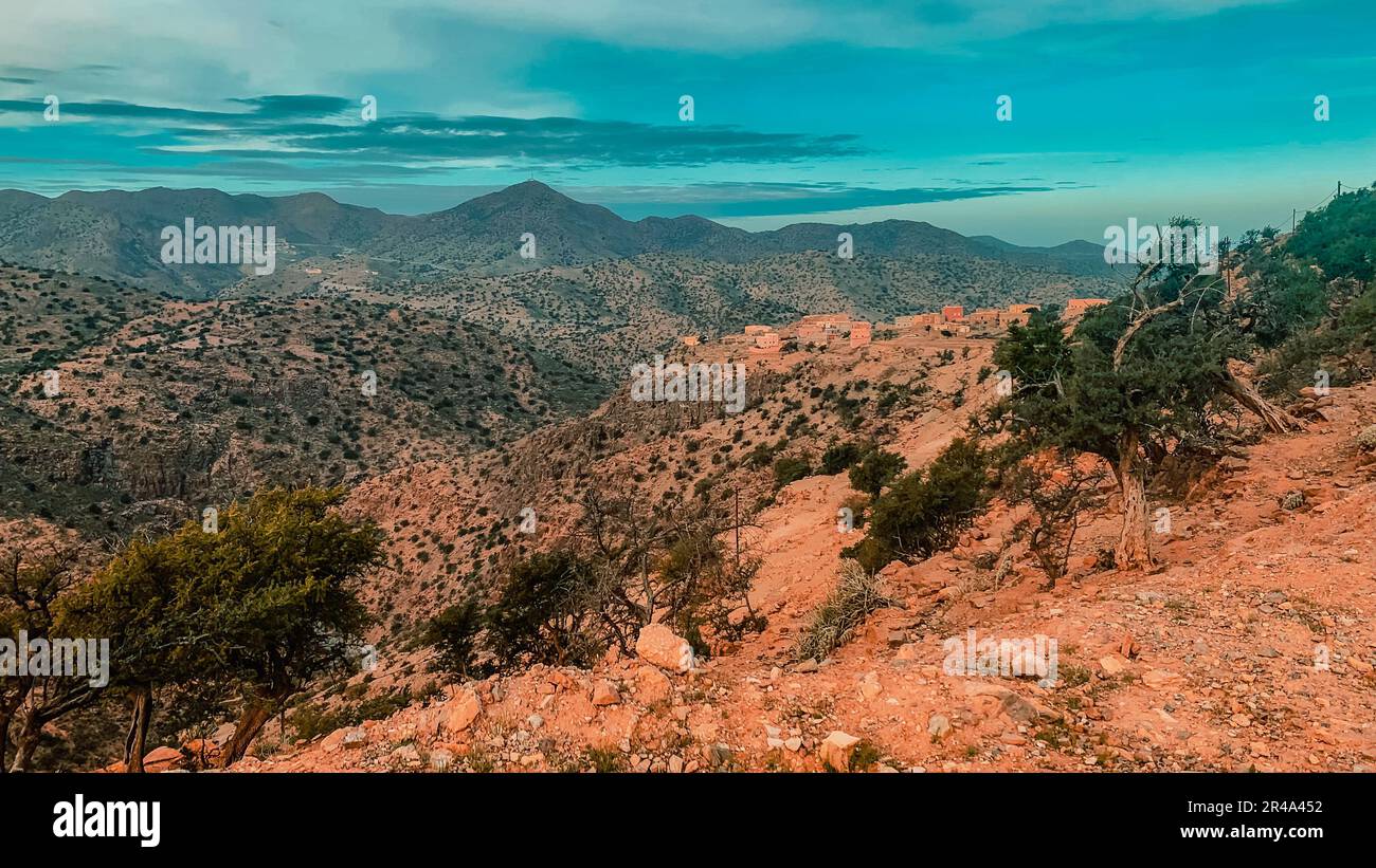A scenic landscape view featuring trees, rocks and bushes in Morocco ...