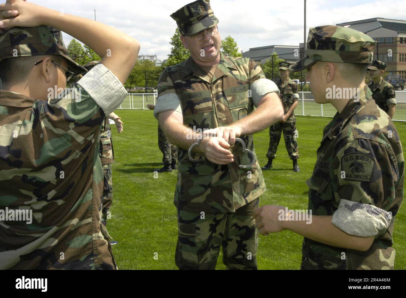US Navy Master-at-Arms 1st Class center, assigned to Naval Station ...