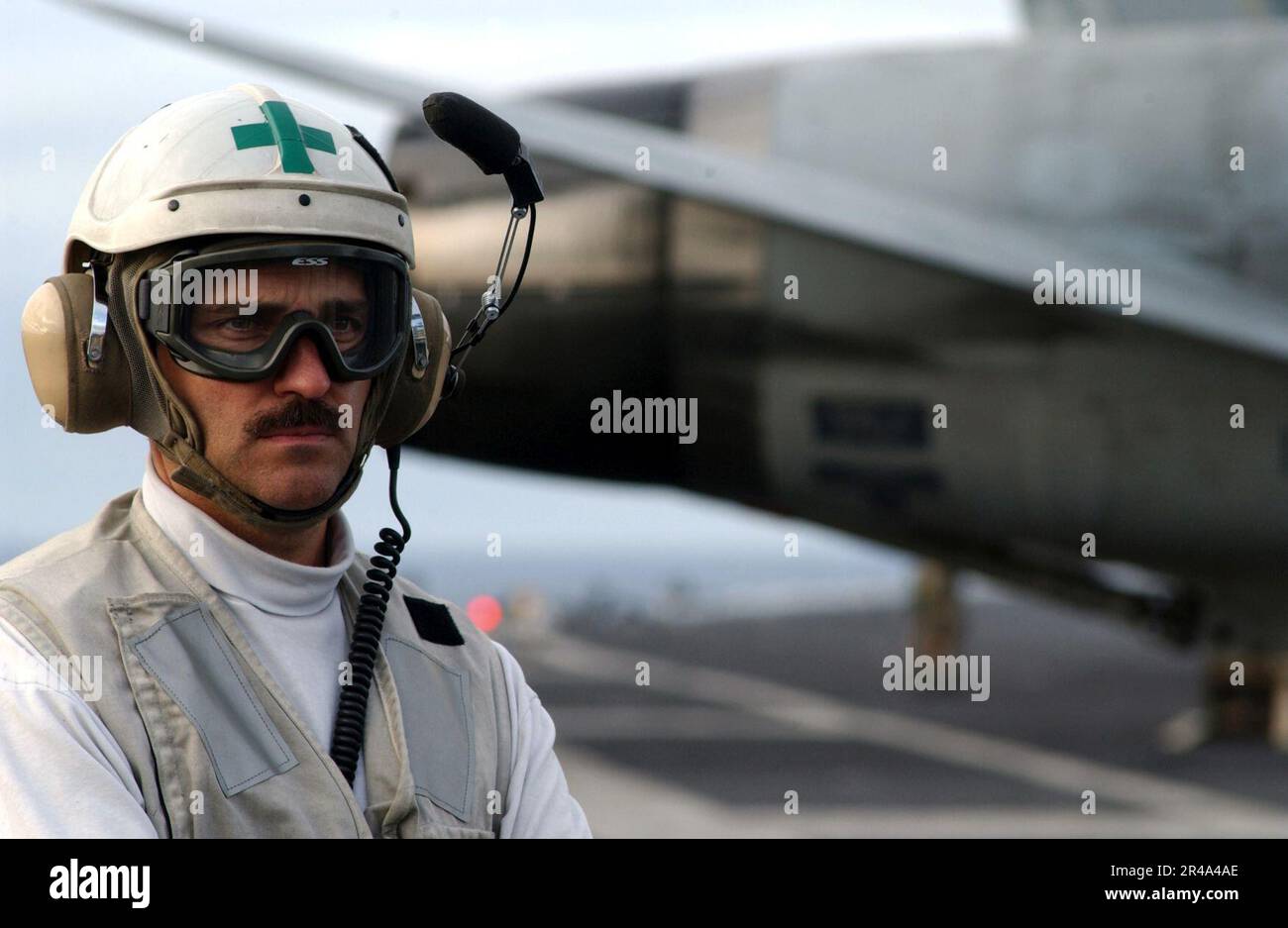 US Navy Safety Officer, Cmdr. David Onstott keeps a watchful eye on the ...
