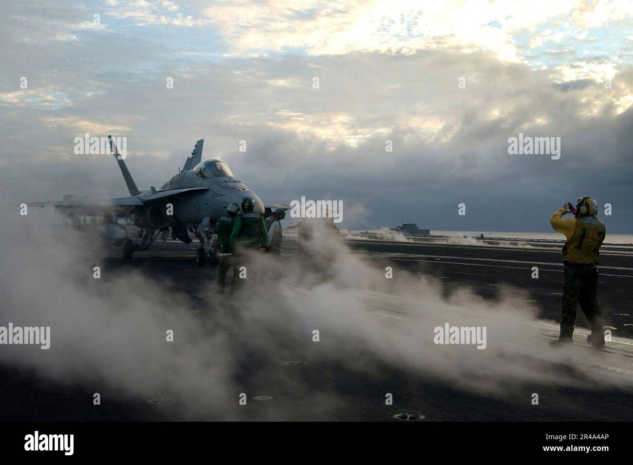 US Navy An F-A-18C Hornet assigned to the Gunslingers of Strike Fighter ...