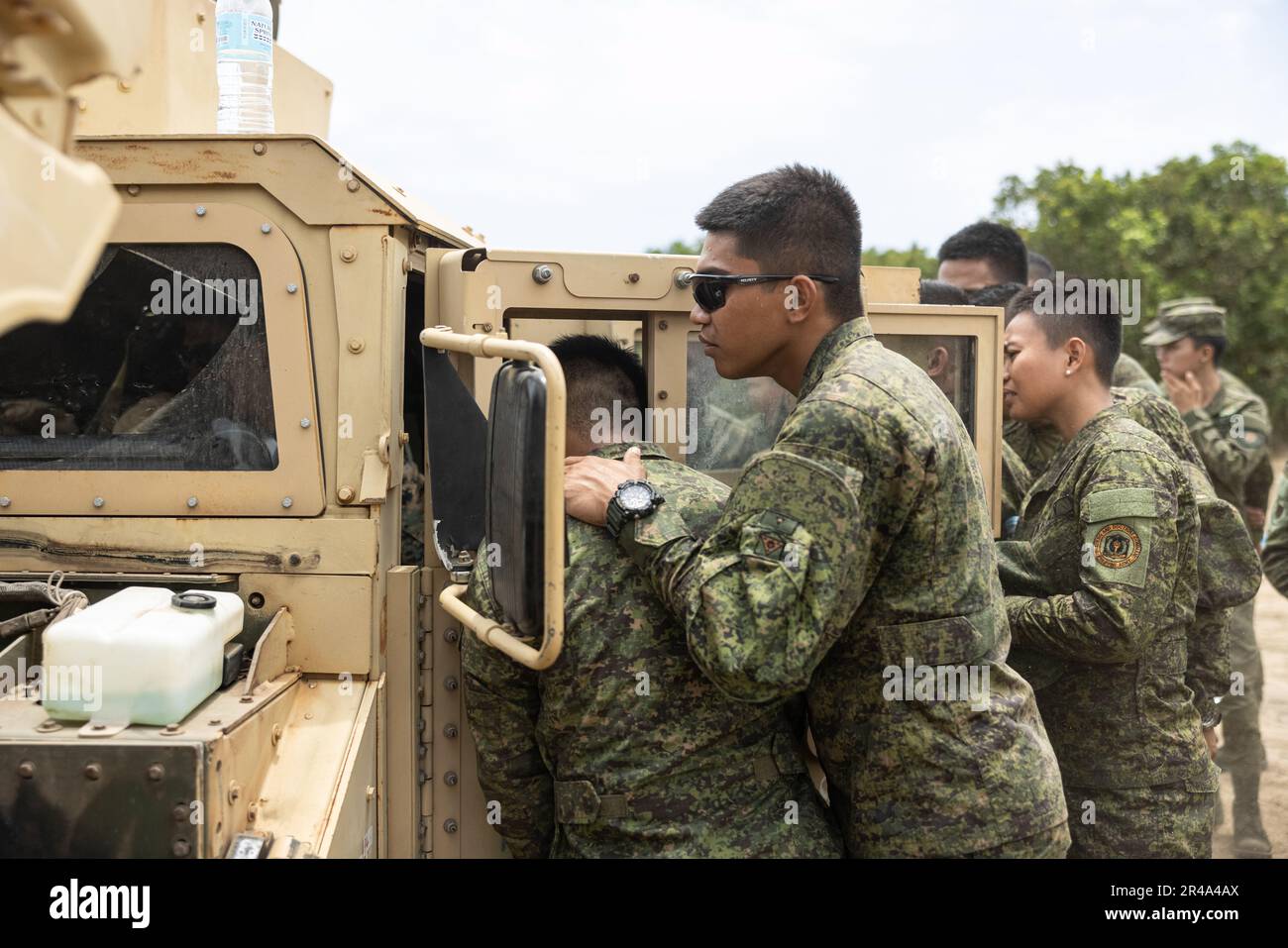Cadets of the Philippine Army observe a U.S. Army Humvee during a tour ...