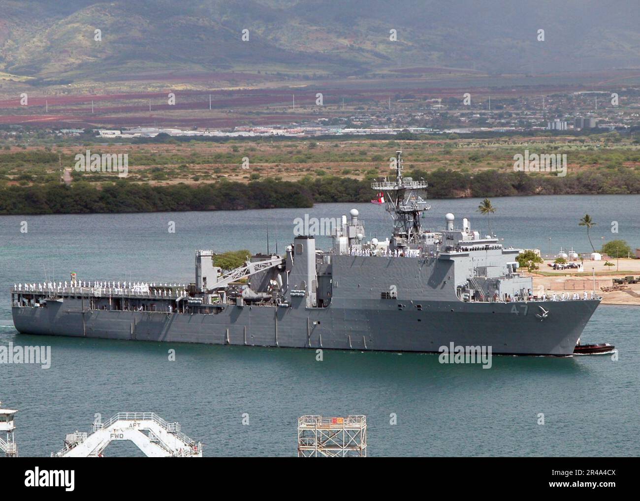 US Navy Sailors aboard the amphibious dock landing ship USS Rushmore ...