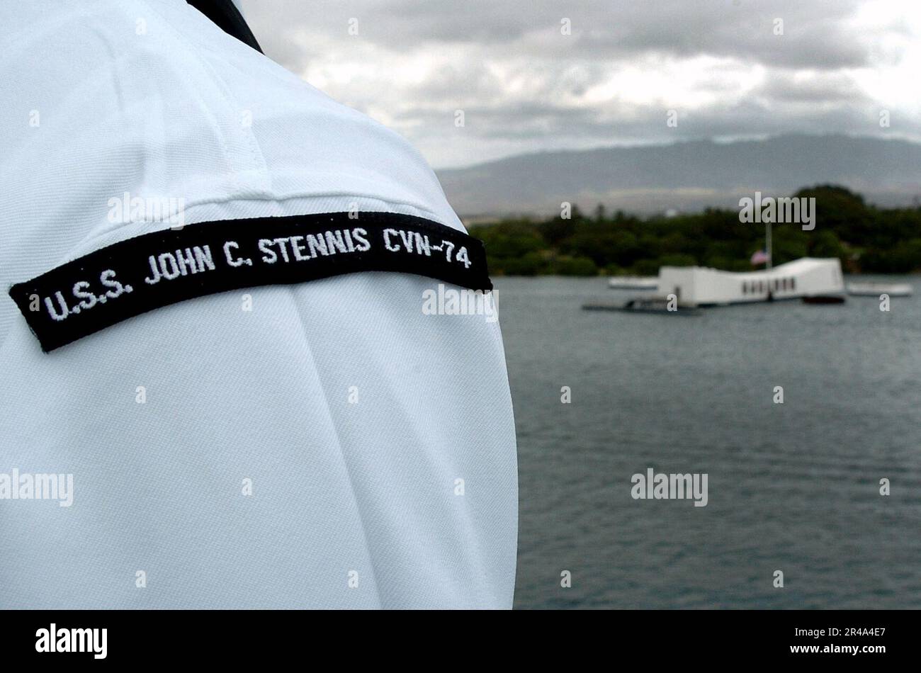 US Navy A Sailor mans the rails as the Nimitz-class aircraft carrier ...