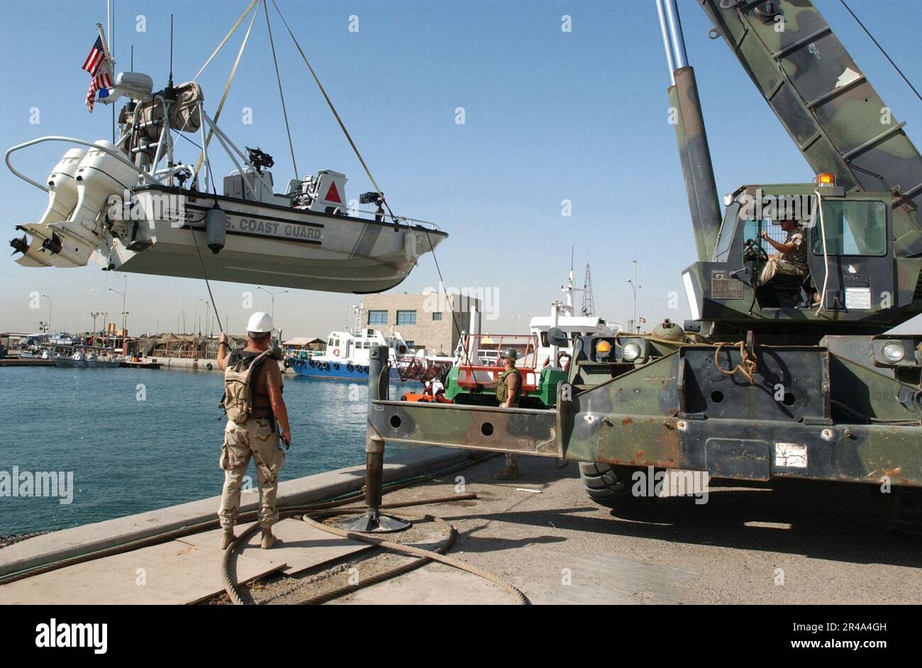US Navy Engineers assigned to U.S. Coast Guard Port Security Unit Three ...