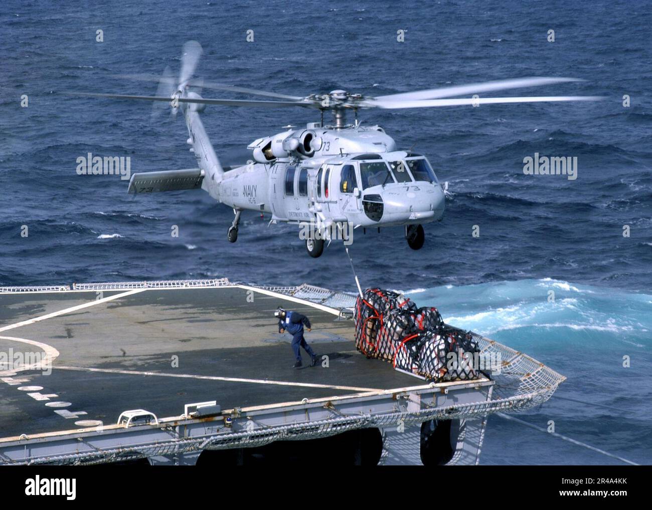 US Navy An MH-60S Knighthawk assigned to the Chargers of Helicopter ...