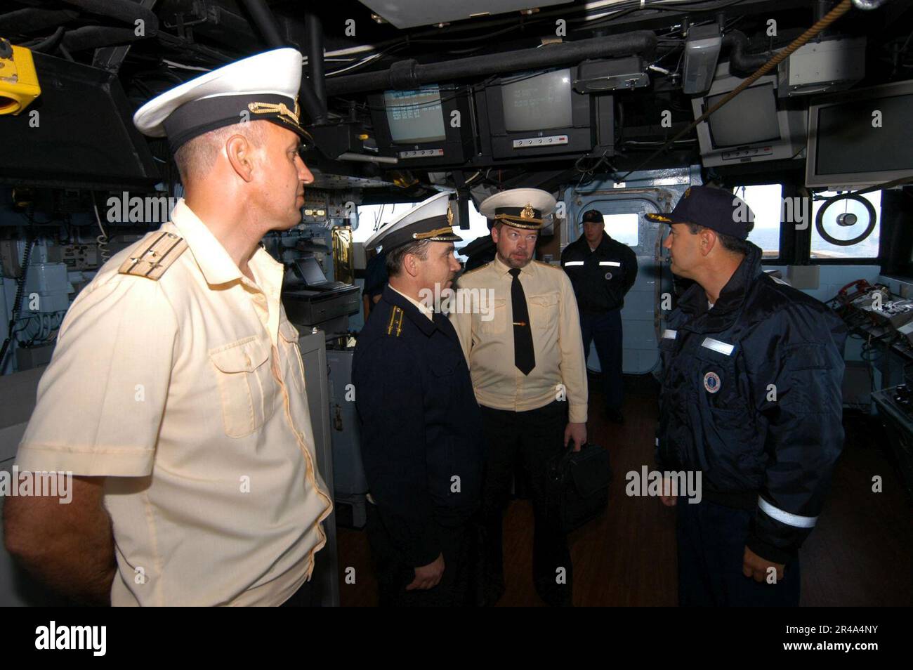 US Navy From right to left, The Commanding Officer of the guided ...