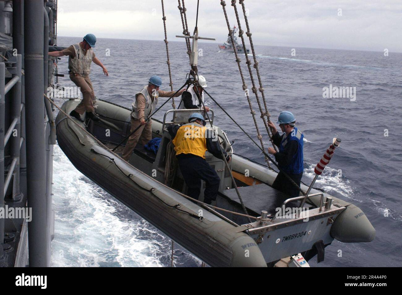 US Navy Sailors assigned to the guided missile cruiser USS Cowpens (CG ...