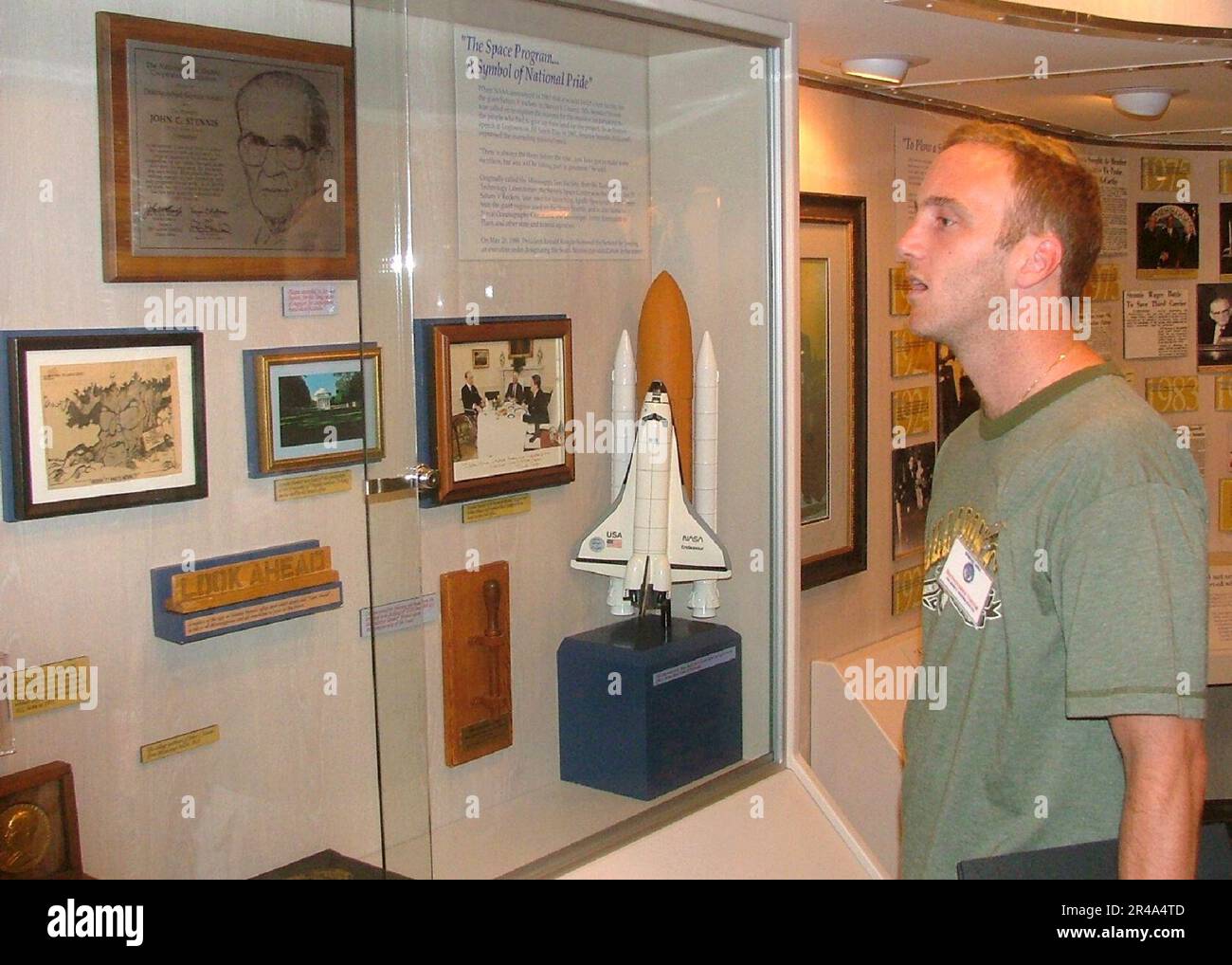 US Navy Actor Jay Mohr takes a moment to look at the museum aboard ...
