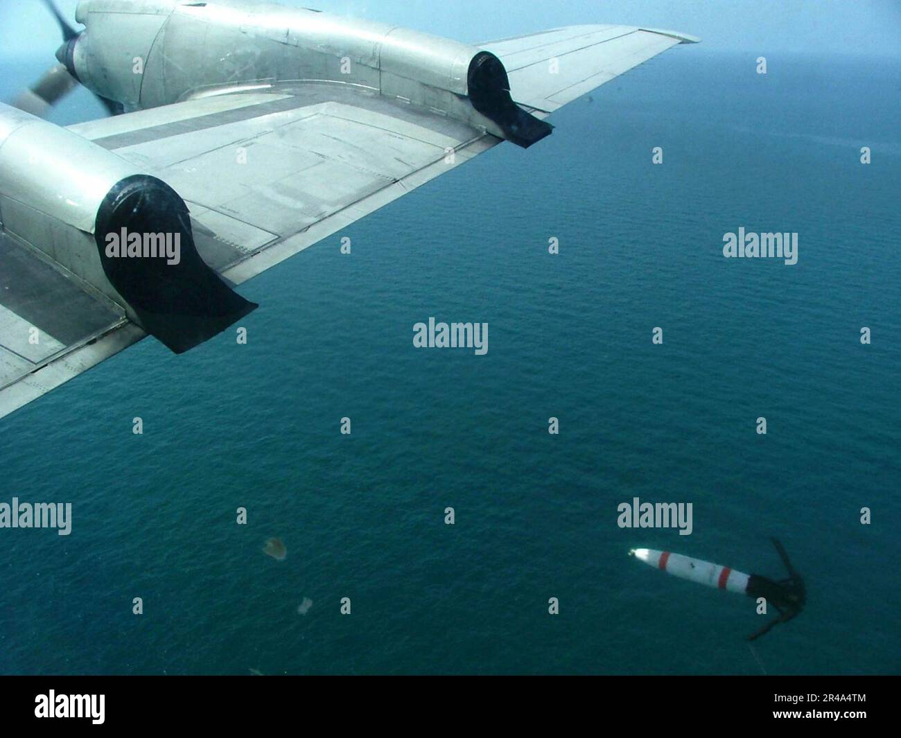 US Navy A MK 62 Quick Strike mine is deployed from the starboard wing ...