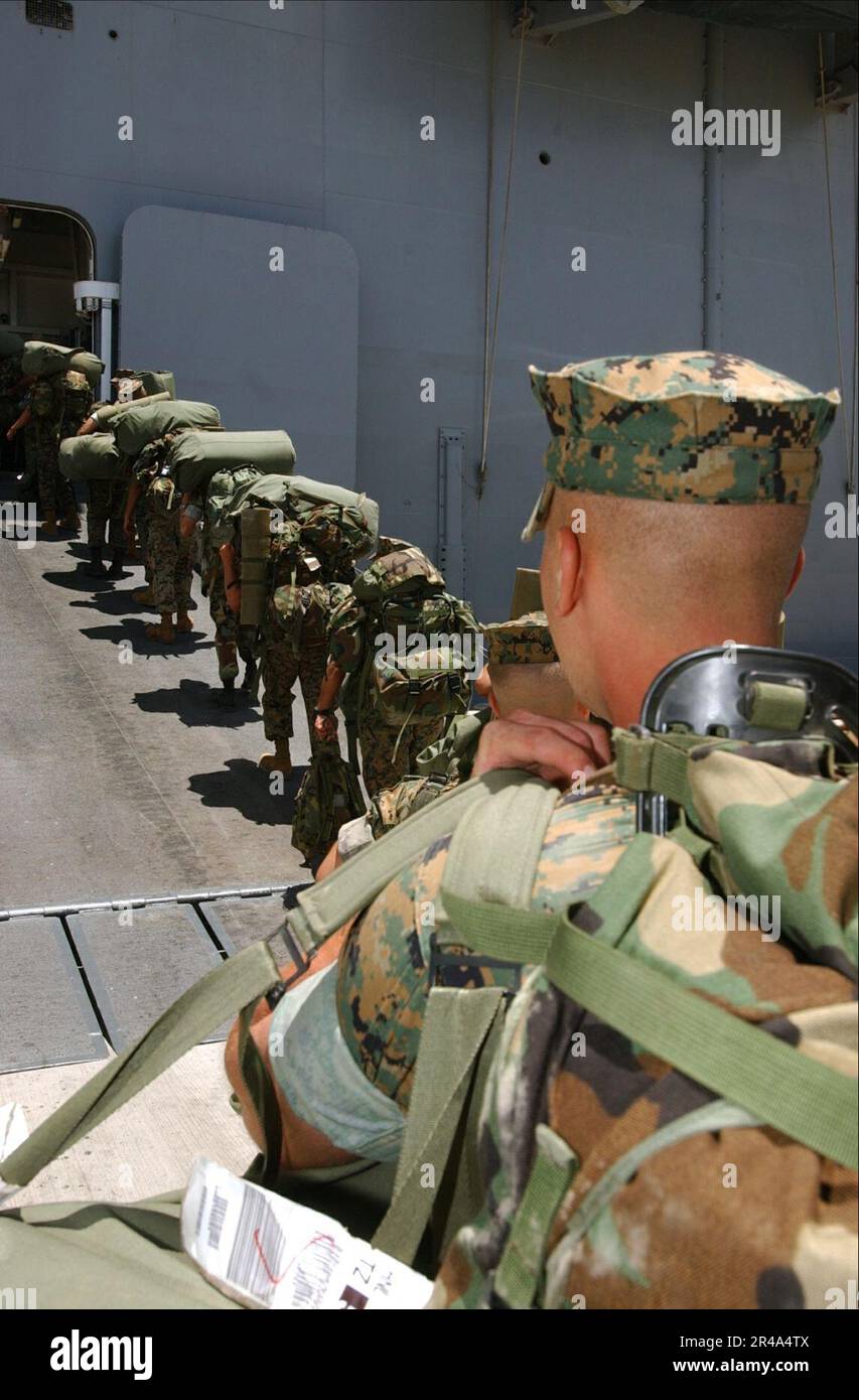 US Navy Marines assigned to 3rd Battalion, 3rd Marine Regiment embark ...