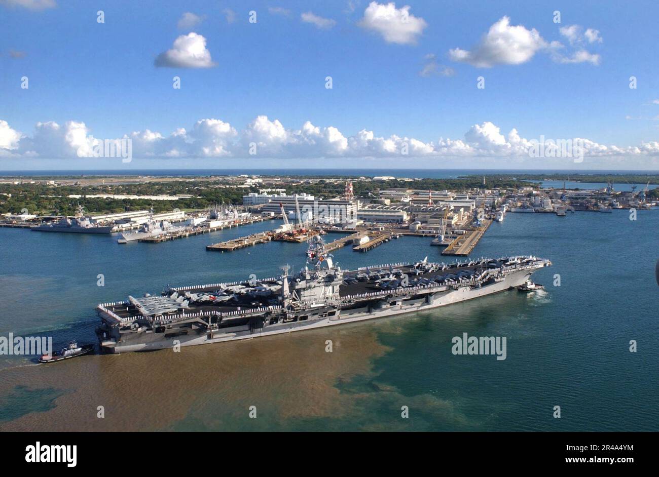US Navy The Nimitz-class aircraft carrier USS John C. Stennis CVN 74 departs Pearl Harbor ...