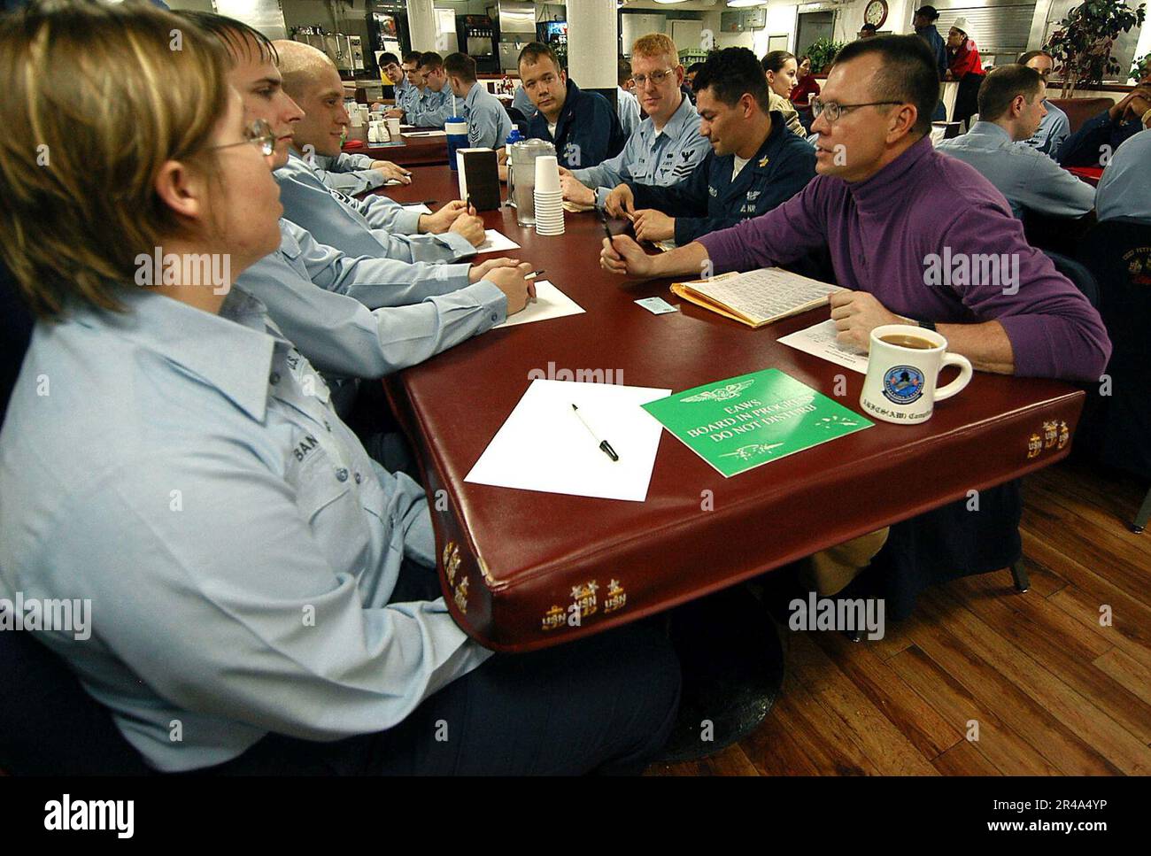 US Navy Sailors are given an oral board for final qualification as ...