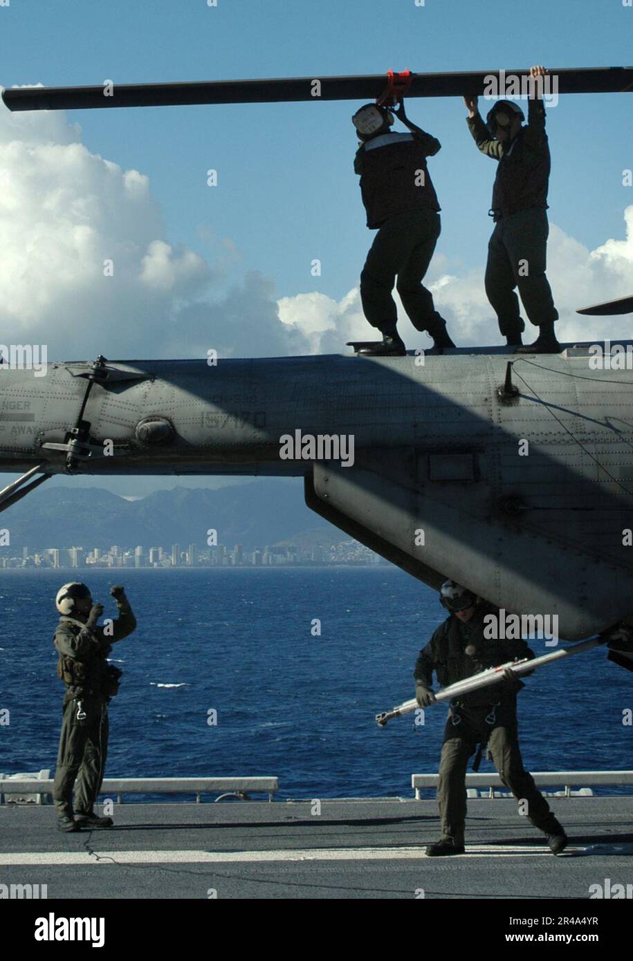 US Navy Maintenance crews from Marine Heavy Helicopter Squadron Three ...