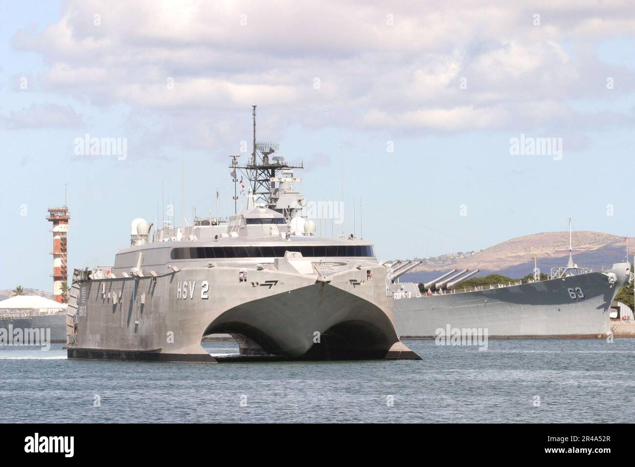US Navy High Speed Vessel Two HSV-2 Swift maneuvers around Ford Island ...