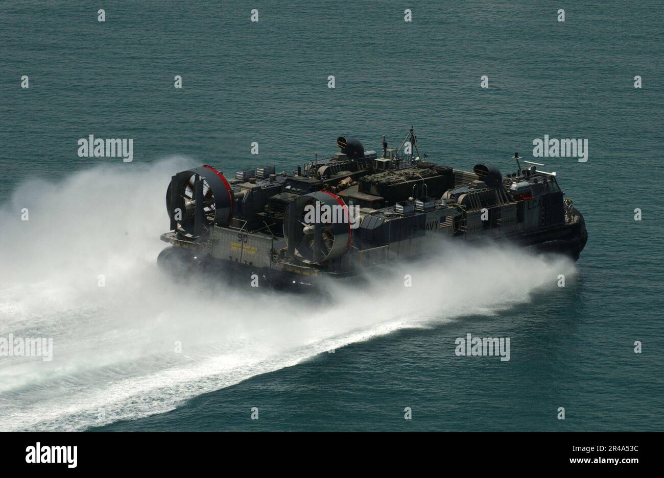 US Navy A Landing Craft Air Cushion Vehicle (LCAC) approaches a beach ...