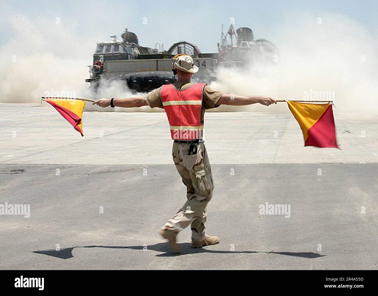 US Navy Operation Specialist 1st Class directs Assault Craft Unit Four ...