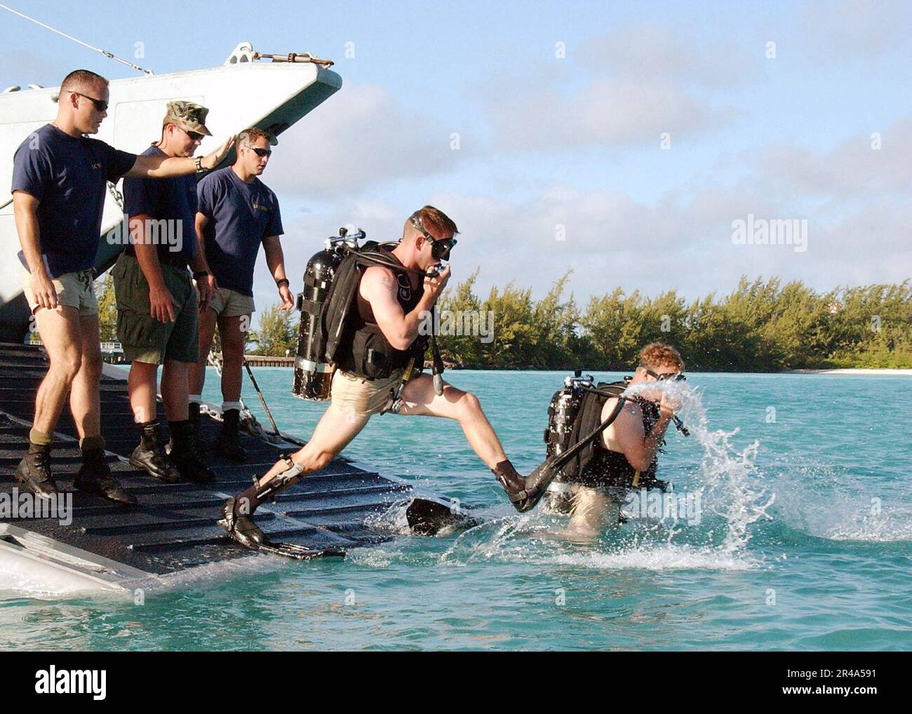 US Navy U.S. Navy Seabees, Constructionman 1st Class steps into the ...