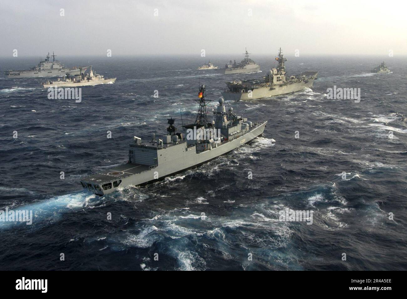 US Navy A formation of multi-nation ships steam through the Atlantic ...